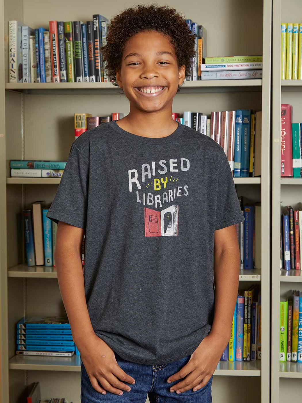 Raised by Libraries kids t-shirt — Out of Print