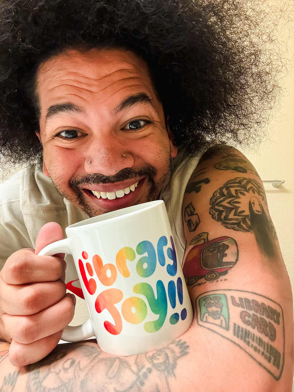 Mychal Threets: The Library is for Everyone unisex t-shirt — Out of Print